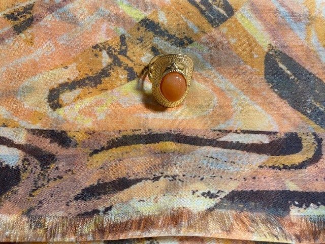 how to put on a scarf ring or cli